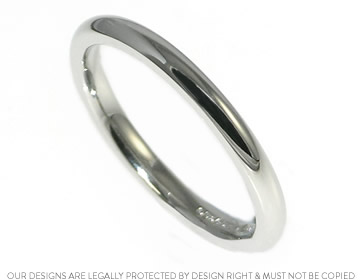 Platinum slim wedding ring with a courting profile