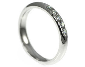 Palladium eternity ring with brilliant cut HSI diamonds totalling 0.12ct