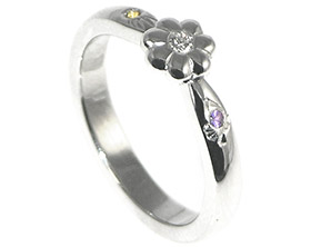 Primrose inspired bespoke diamond and sapphire engagement ring